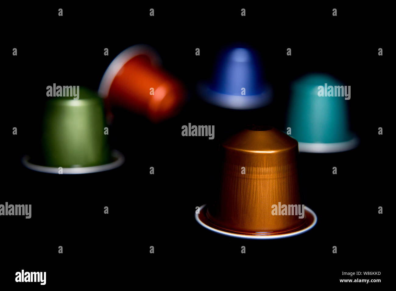 selective focus on set of coffee capsules of different flavors and ...