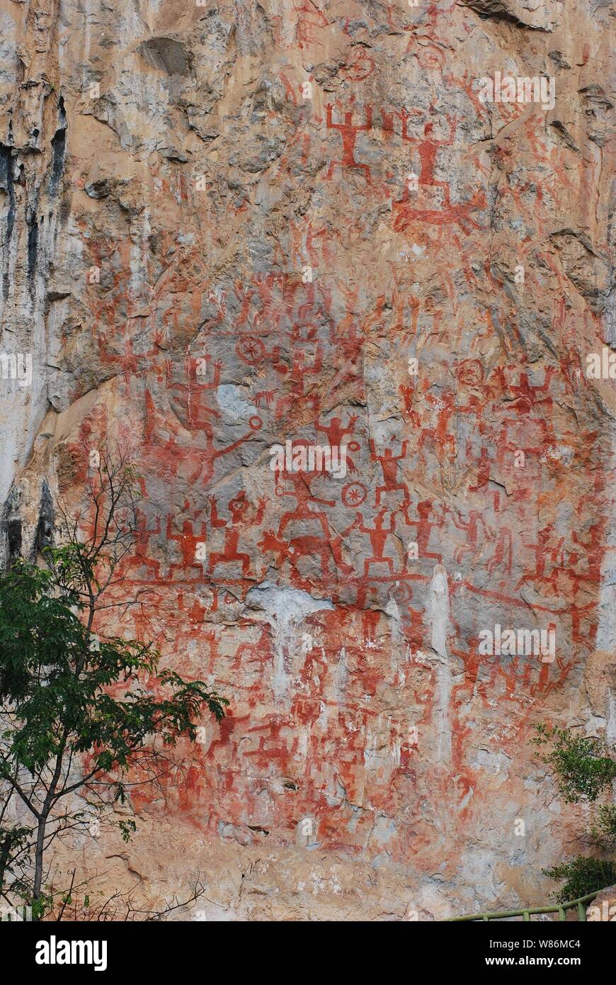 A view of rock paintings on the Huashan Mountain by the Zuojiang River ...