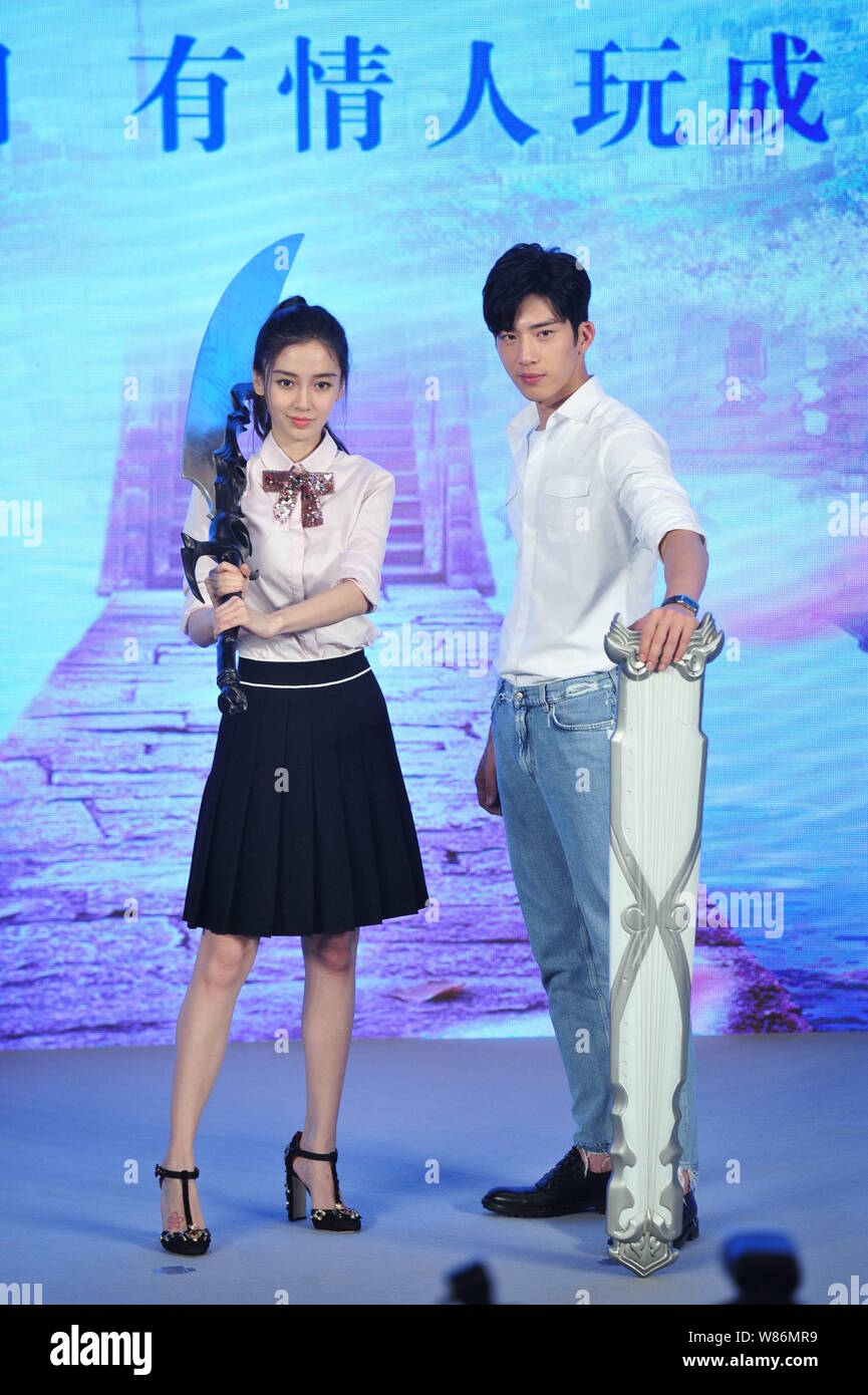 Hong Kong model and actress Angelababy, left, and Chinese actor Jing ...