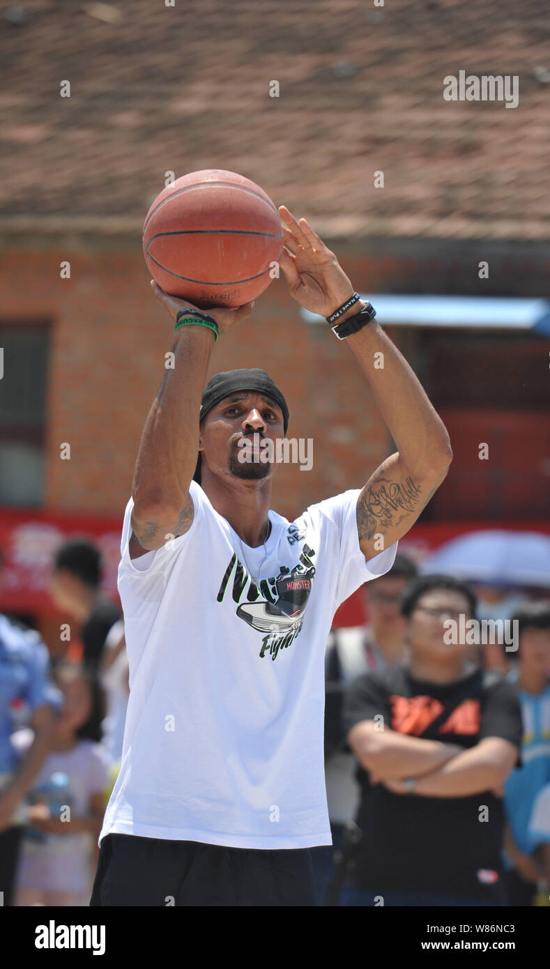 NBA star George Hill shows his basketball skills at a charity event ...
