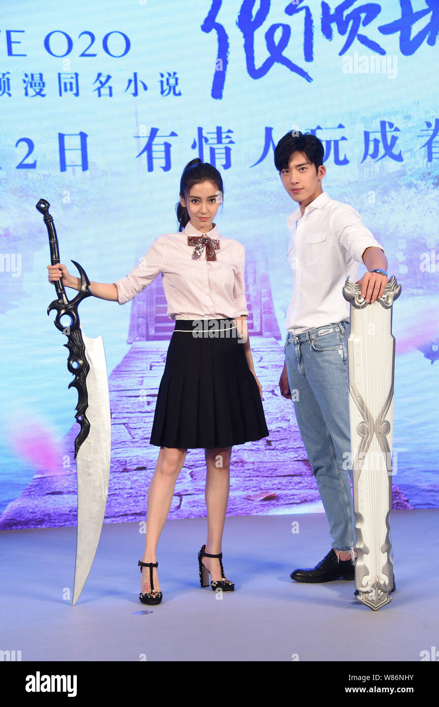 Hong Kong model and actress Angelababy, left, and Chinese actor Jing ...