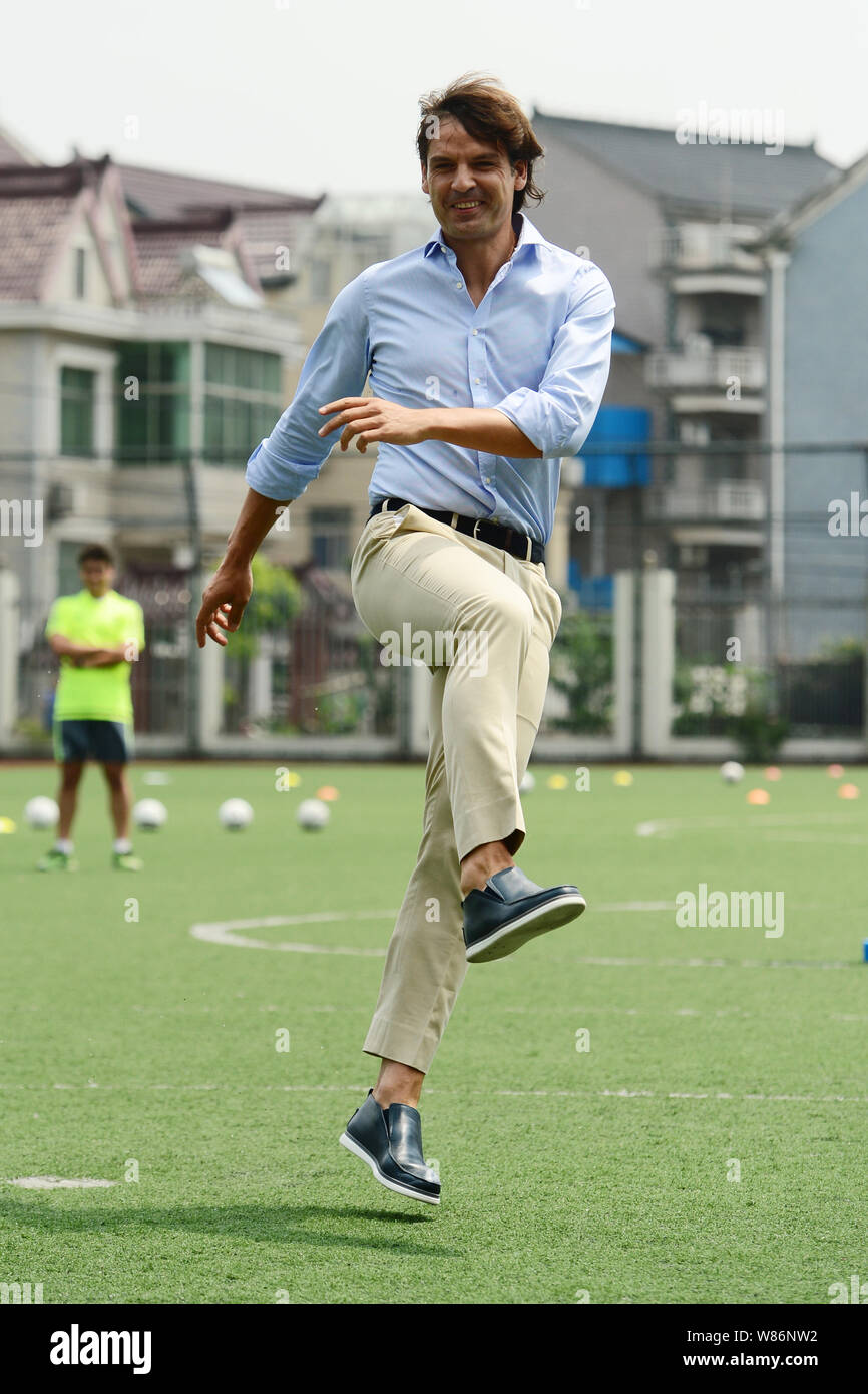 Retired Spanish football player Fernando Morientes shows his soccer ...
