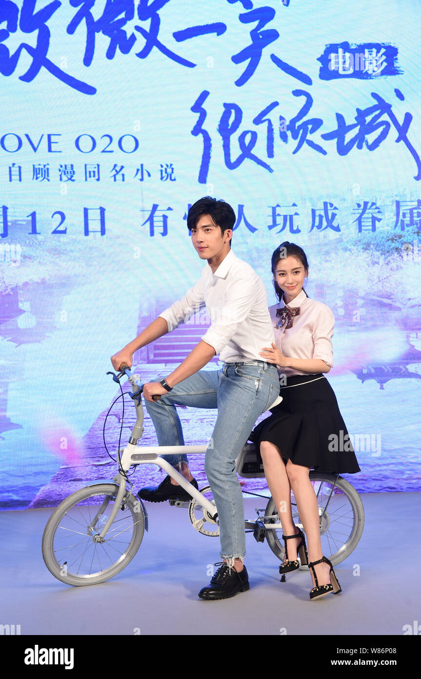 Hong Kong model and actress Angelababy, right, and Chinese actor Jing ...