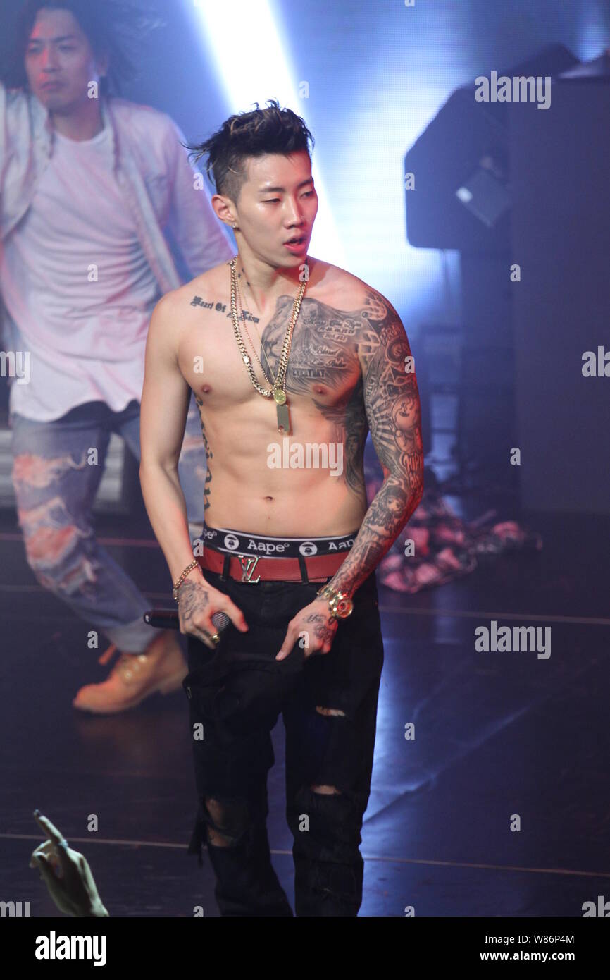 A member of South Korean idol group AOMG performs at their concert in ...