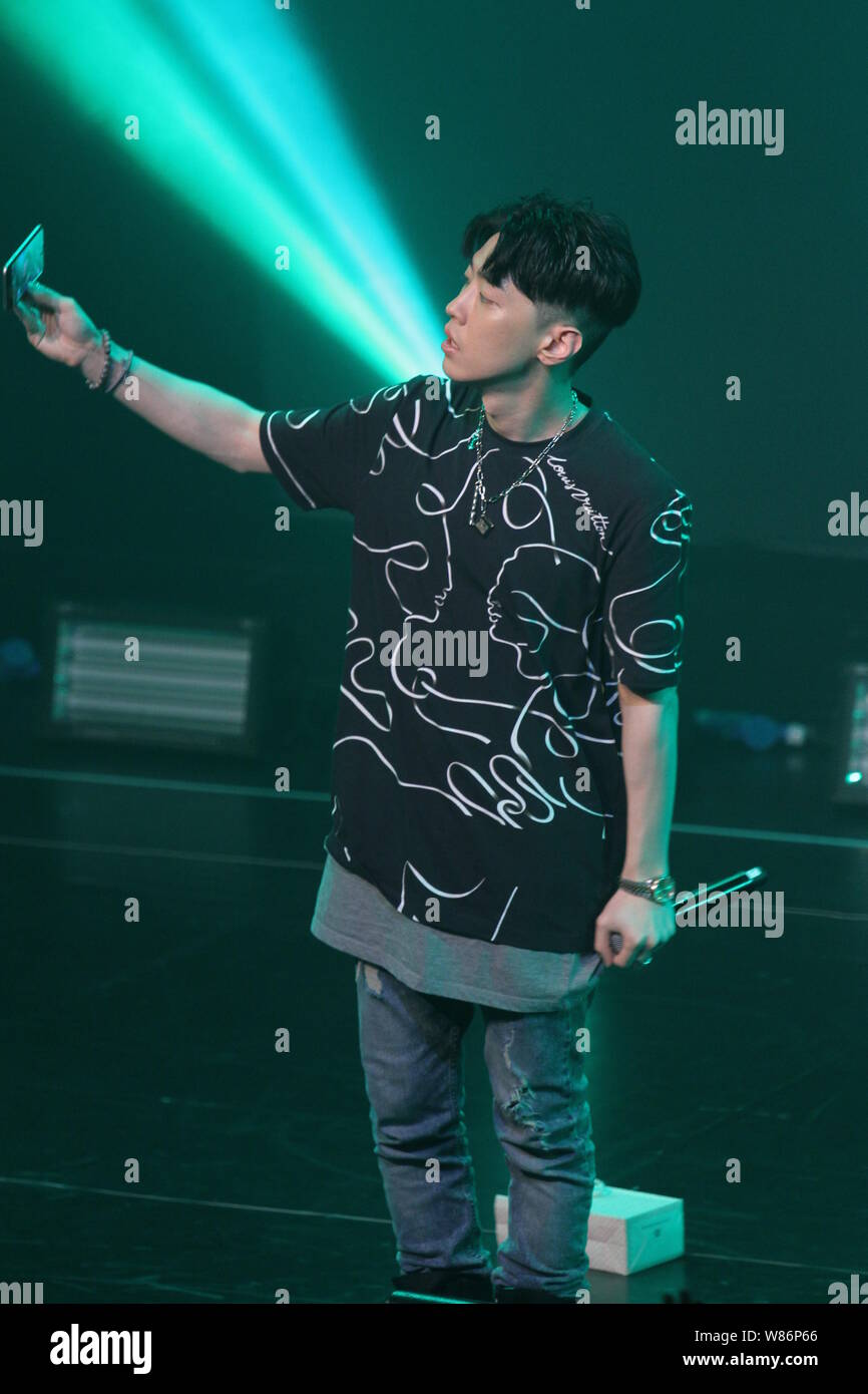 A member of South Korean idol group AOMG performs at their concert in ...