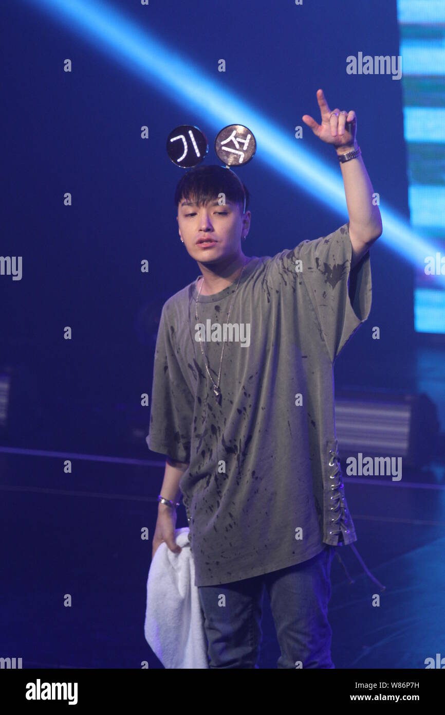 A member of South Korean idol group AOMG performs at their concert in ...