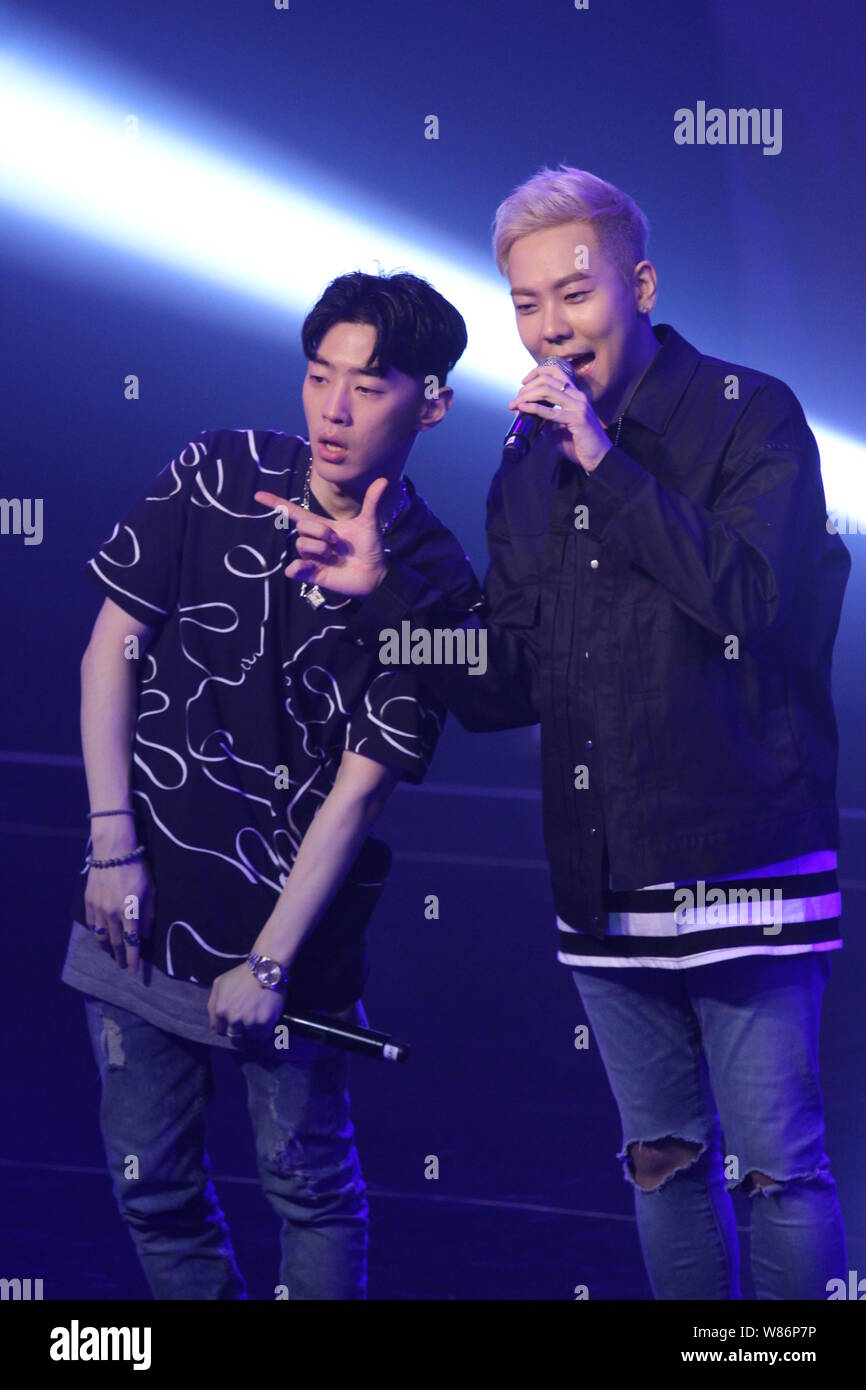 Members of South Korean idol group AOMG perform at their concert in ...
