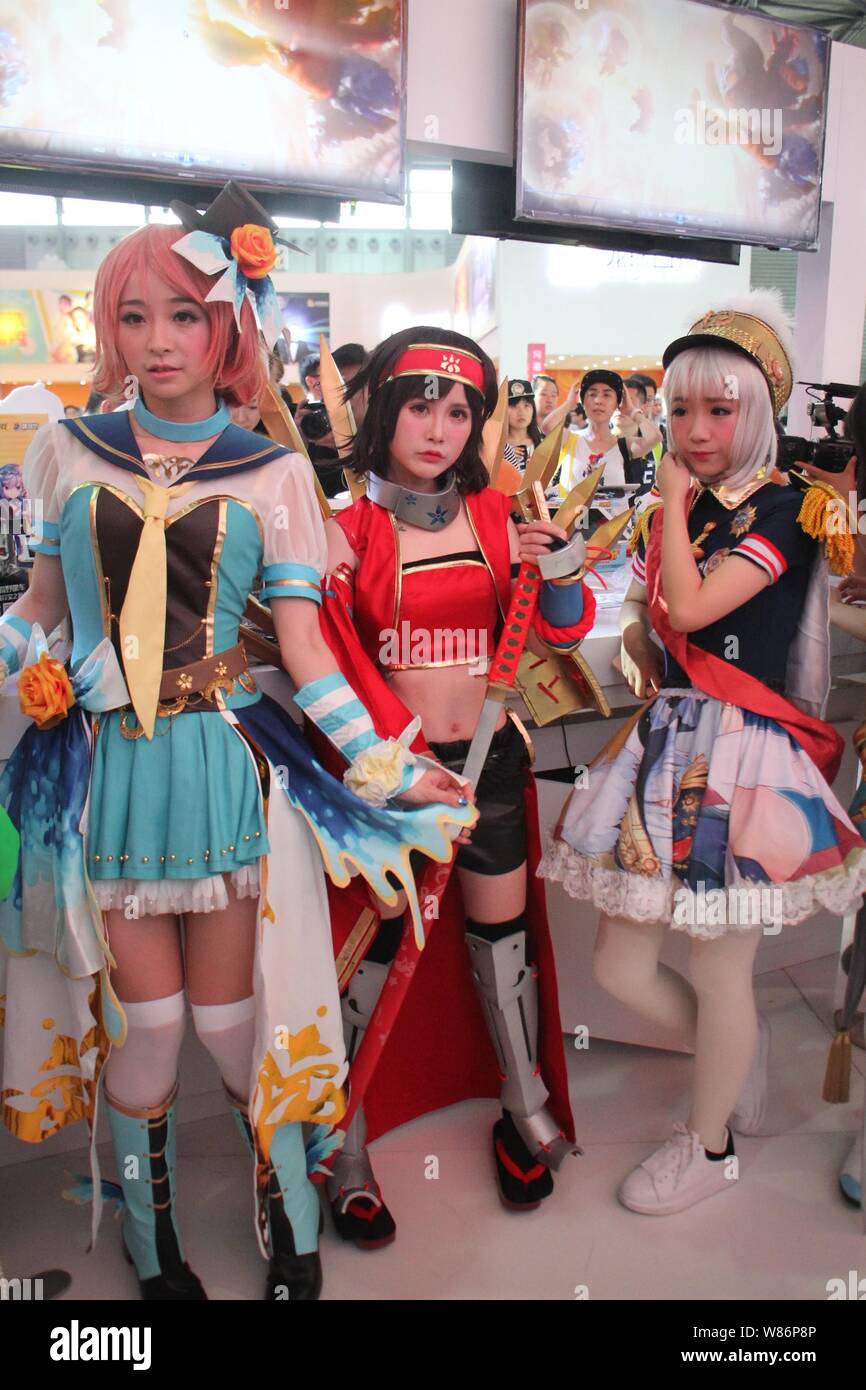 Entertainers dressed in cosplay costumes pose during the 14th China ...