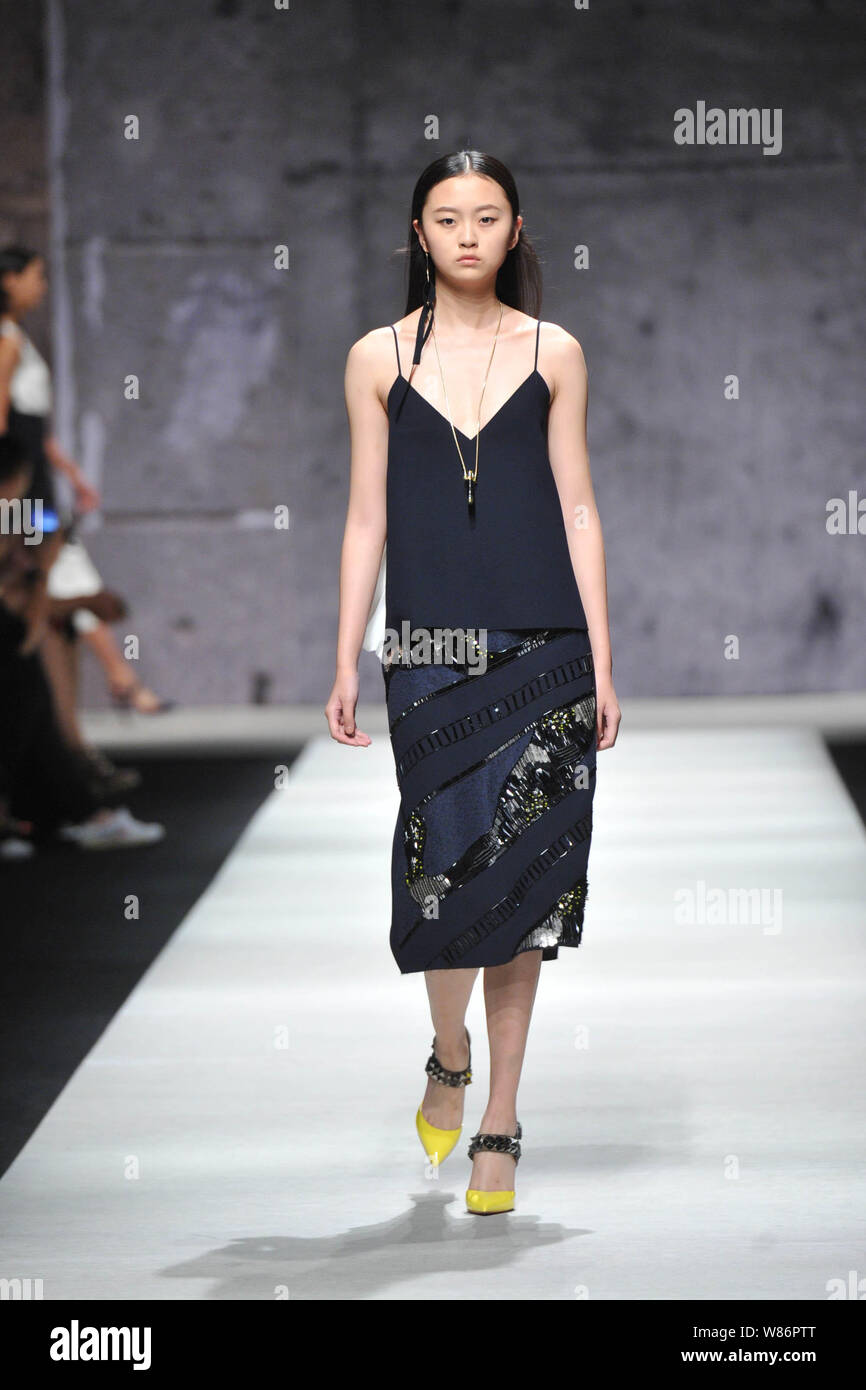 A model displays a new creation by Chinese fashion designer Lv Yan or ...