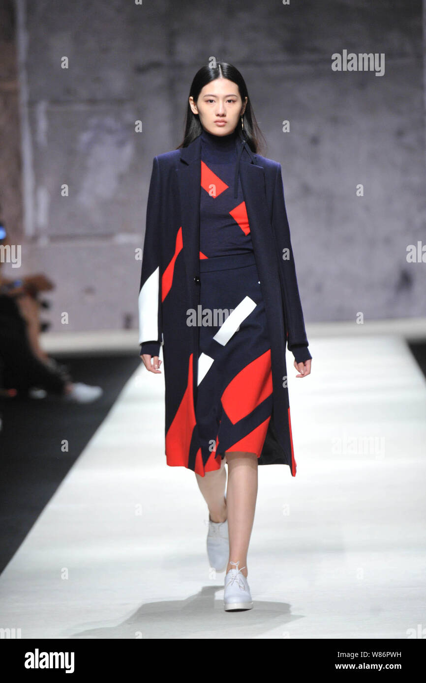 A model displays a new creation by Chinese fashion designer Lv Yan or ...