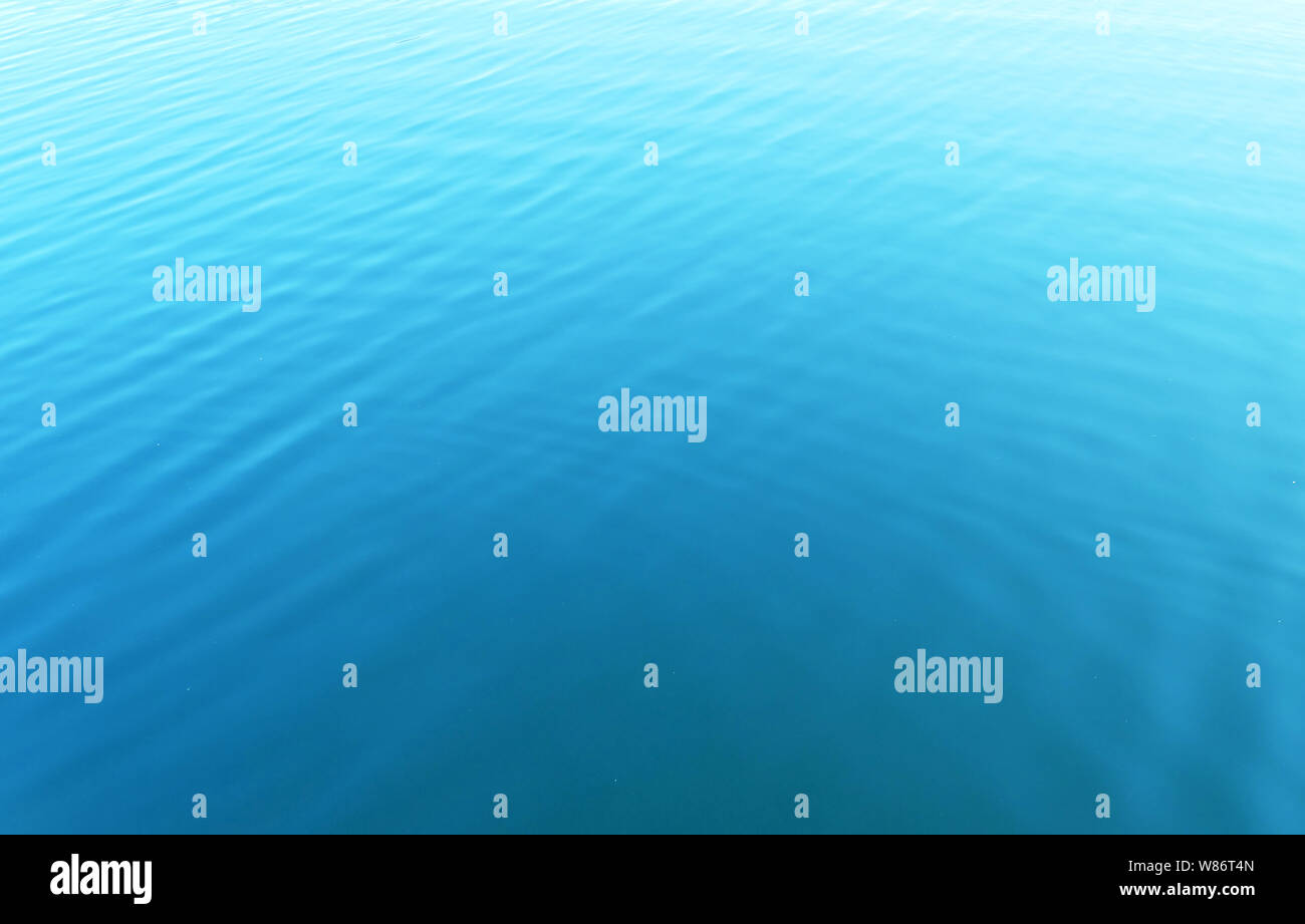Blue water texture as background Stock Photo - Alamy