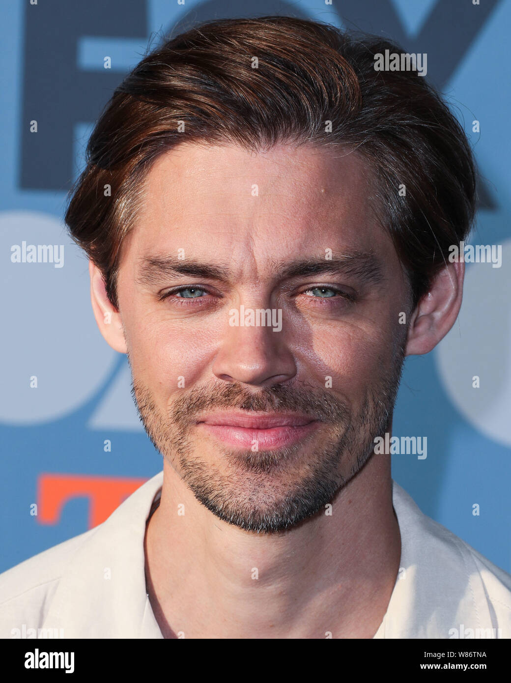 LOS ANGELES, CALIFORNIA, USA - AUGUST 07: Actor Tom Payne arrives at ...