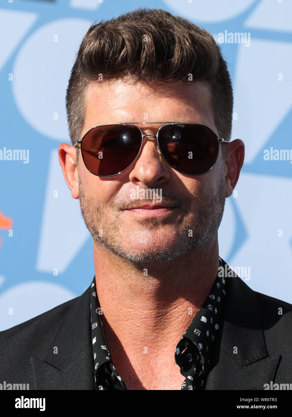 LOS ANGELES, CALIFORNIA, USA - AUGUST 07: Singer Robin Thicke arrives ...