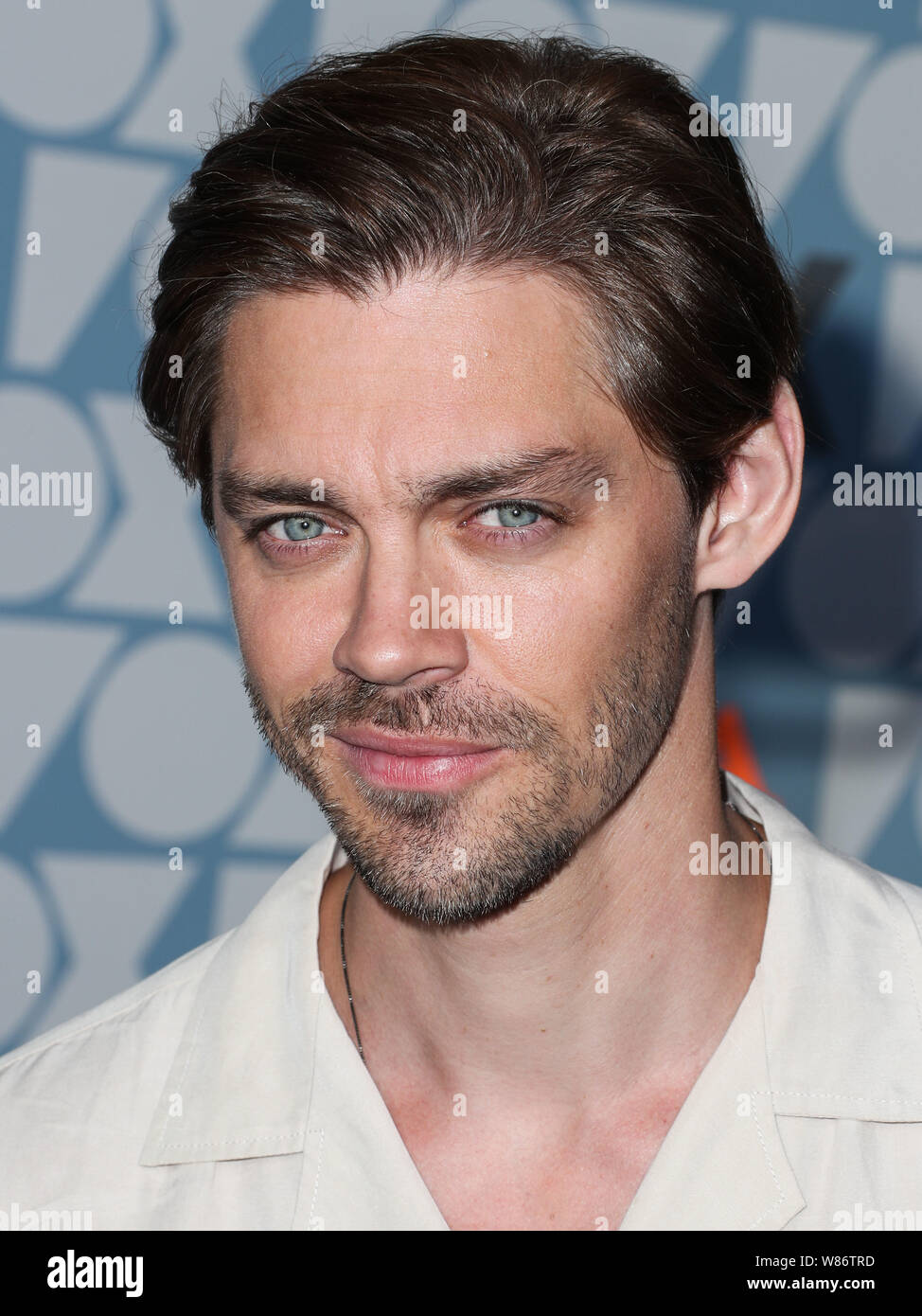 LOS ANGELES, CALIFORNIA, USA - AUGUST 07: Actor Tom Payne arrives at ...