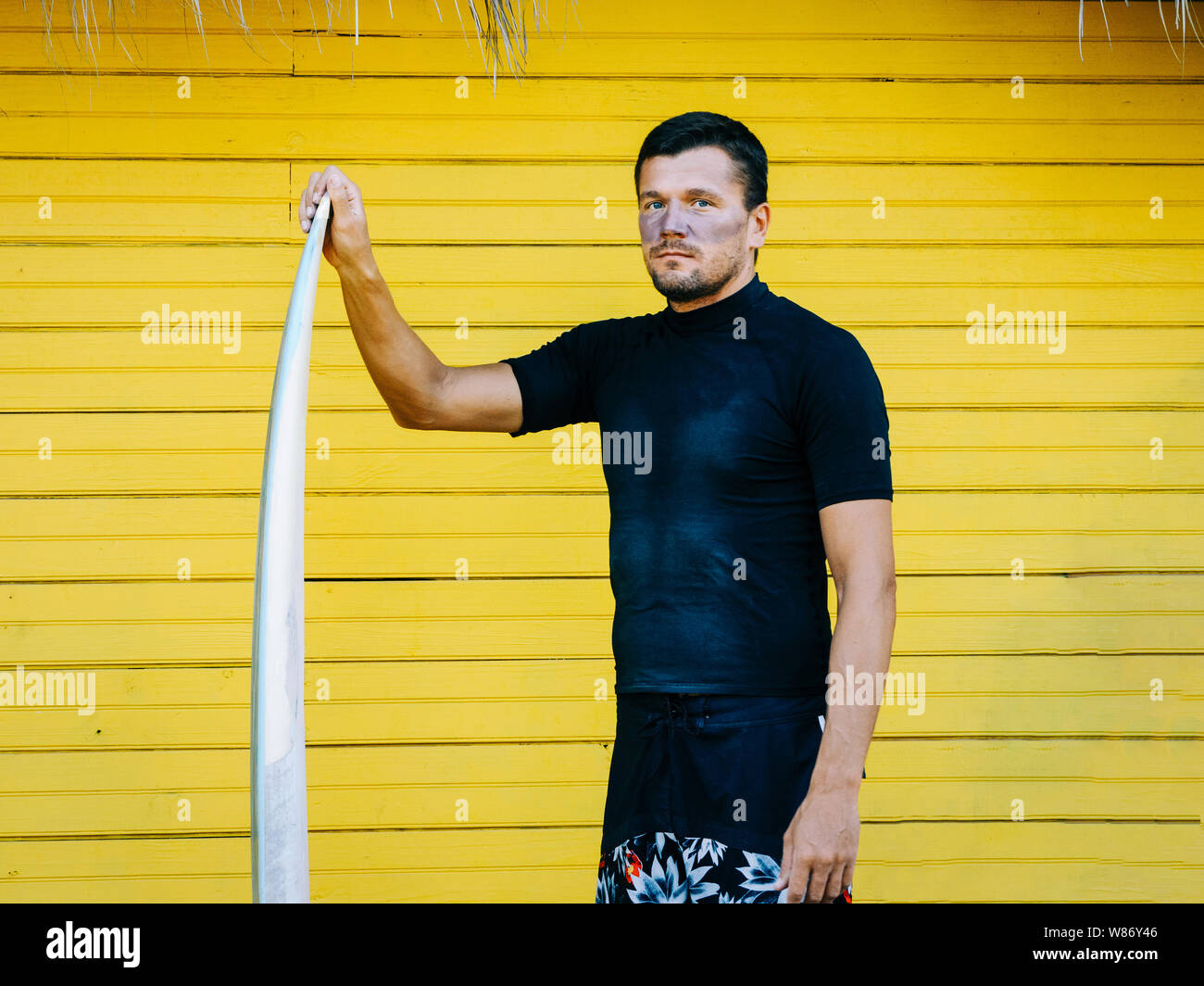 Surfer on the face of a sunscreen hi-res stock photography and images ...