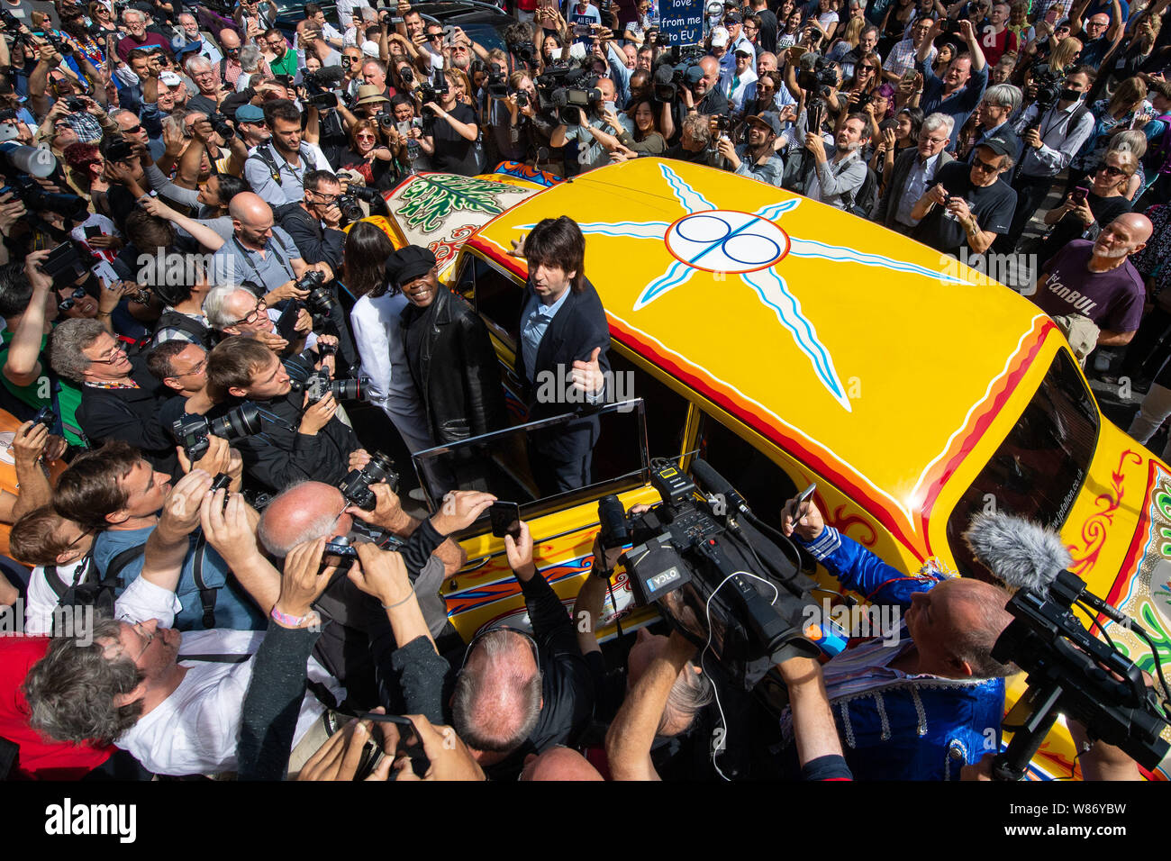 Beatles lookalike band 'Fab Four' are greeted by fans as they arrive at ...