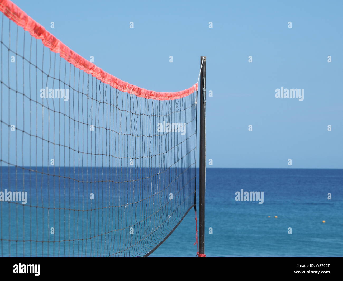 Closeup of a volleyball net on the beach Stock Photo - Alamy