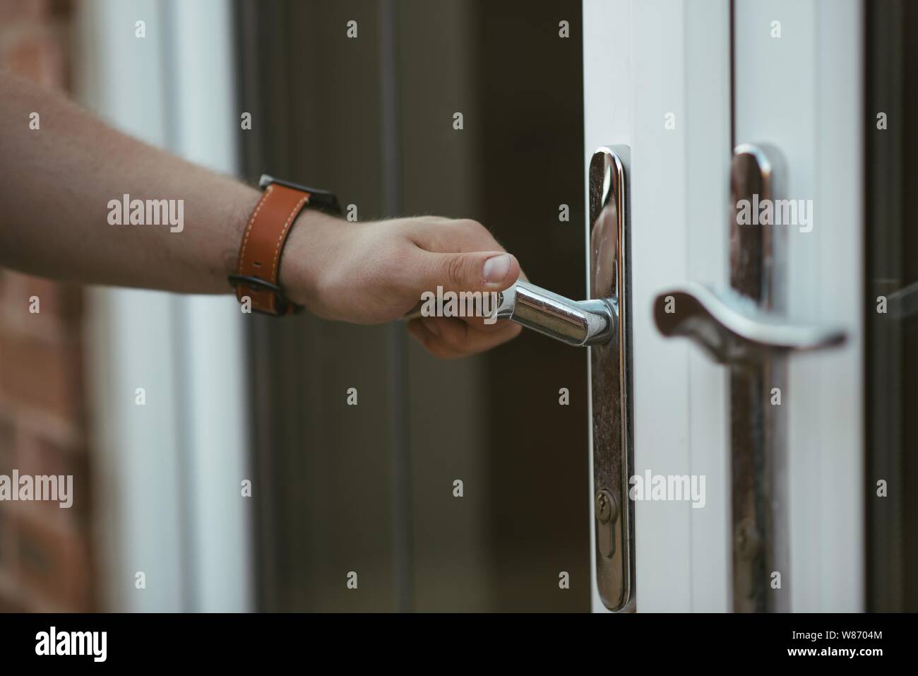 Woman hand opening door close hi-res stock photography and images - Alamy