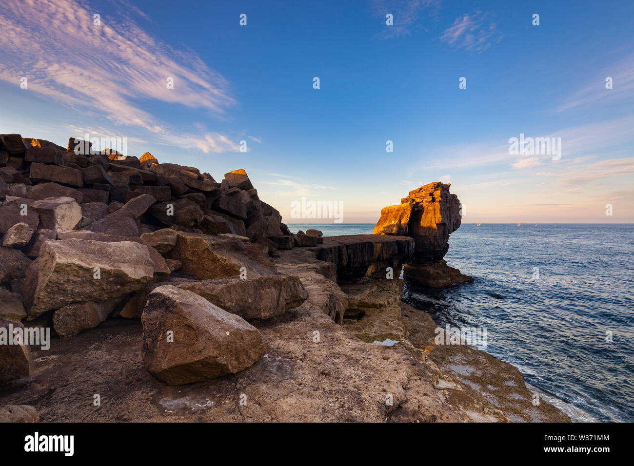 The sun illuminates the pulpit rock in the early morning at Portland ...