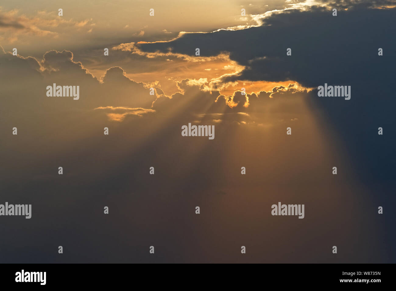 Sunset under the clouds before the storm Stock Photo - Alamy