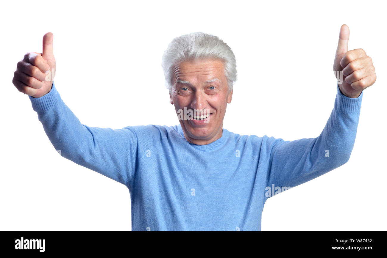 happy senior man showing thumbs up on white background Stock Photo - Alamy