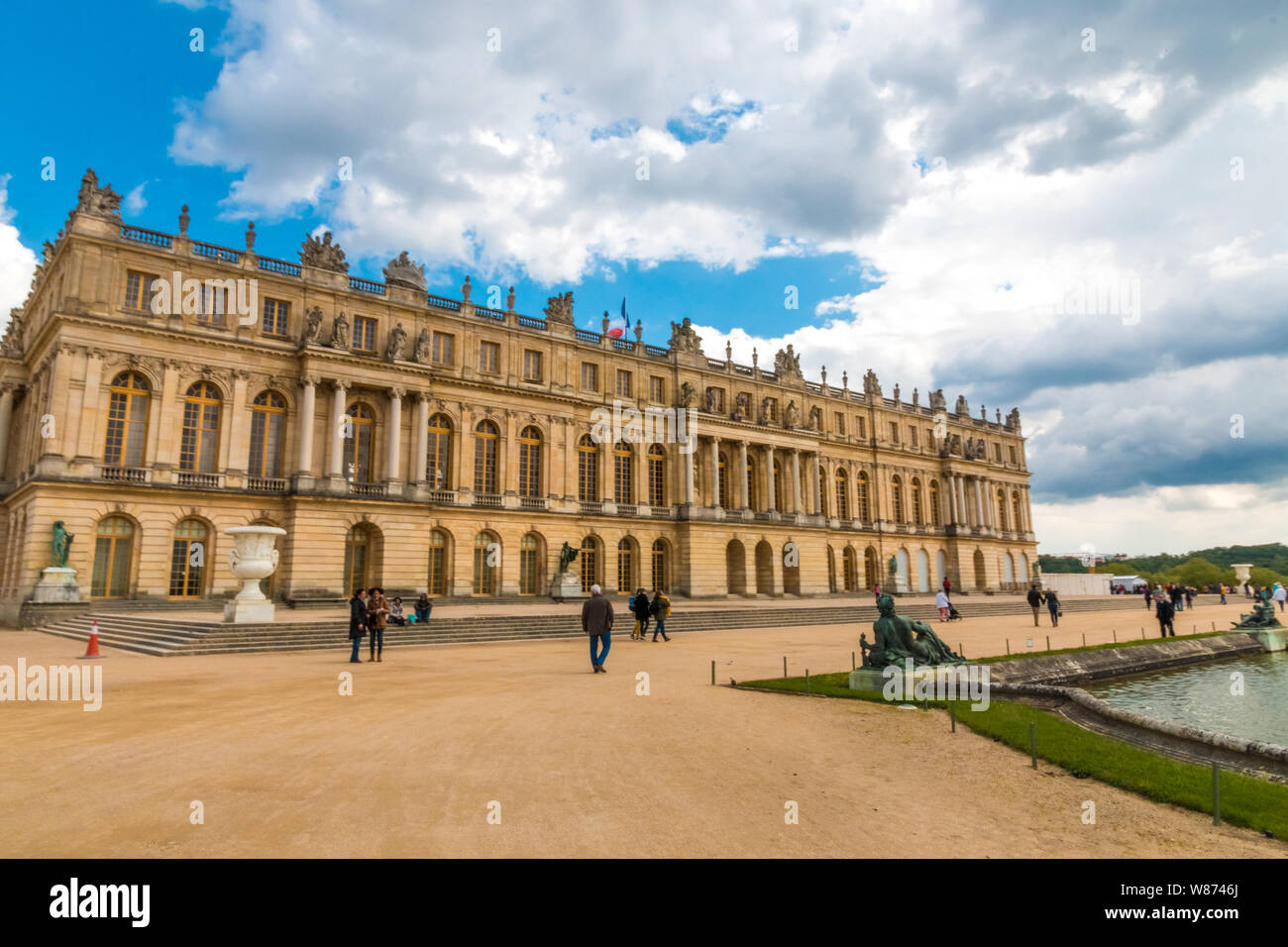 Lovely side view of the west facade of the famous Palace of Versailles ...