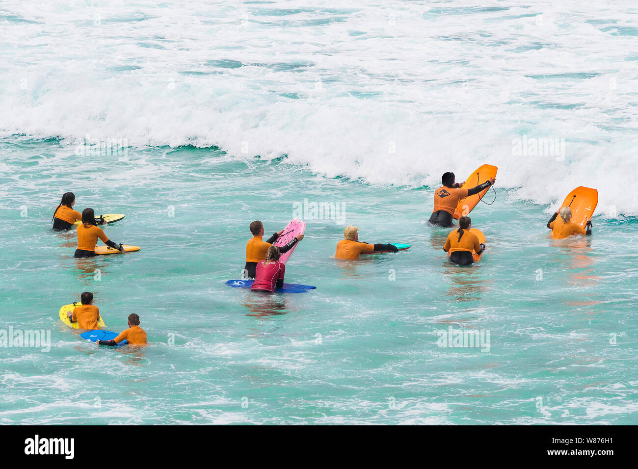 A body boogie boarding lesson at Great Gt Western Beach in Newquay in ...