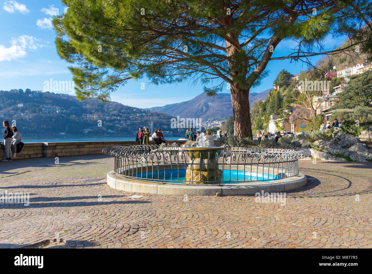 Como, Italy - March 10, 2019: Scenic spot at lake Como with a fountain ...
