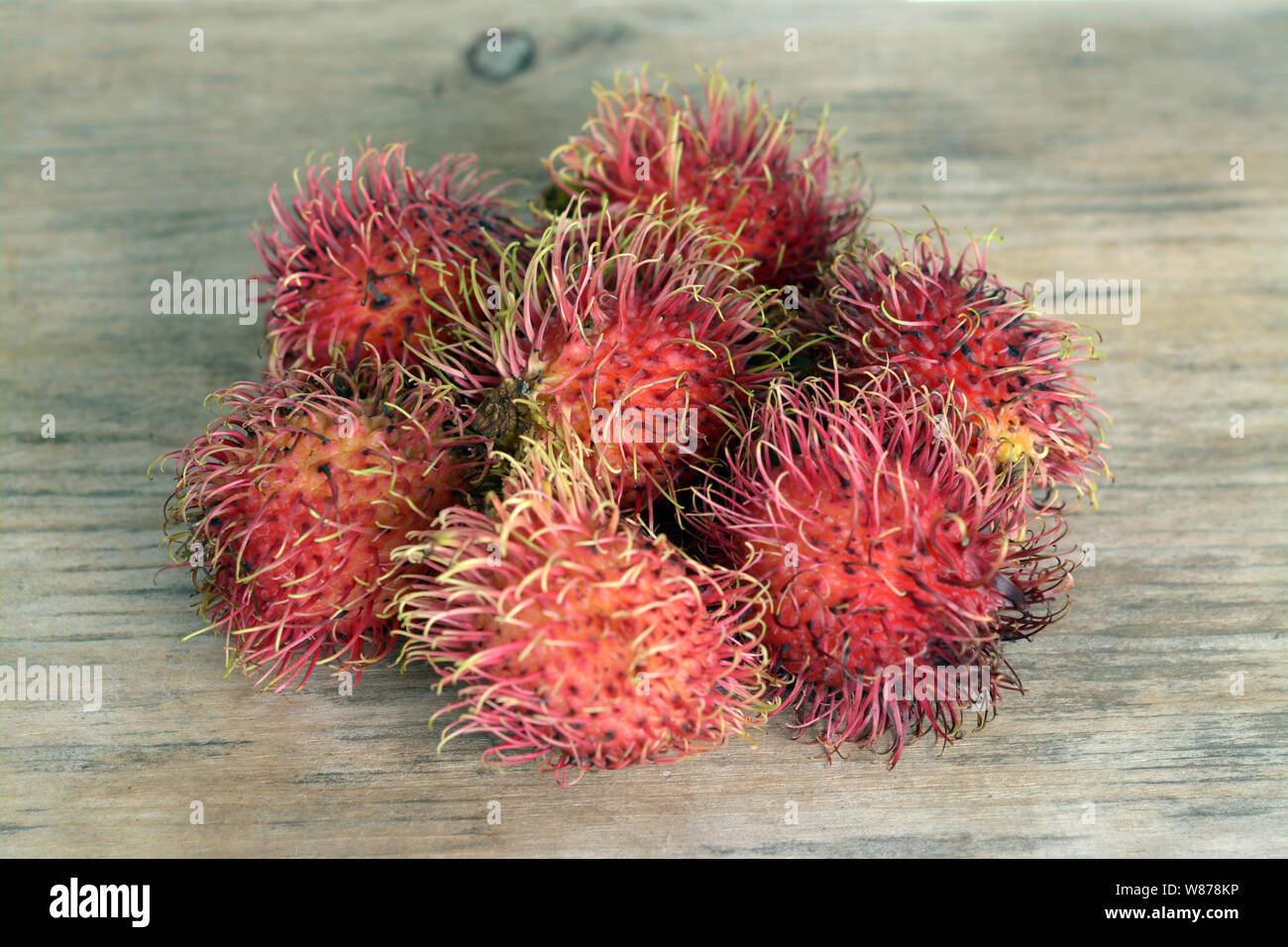 Group of fresh sweet rambutans hi-res stock photography and images - Alamy