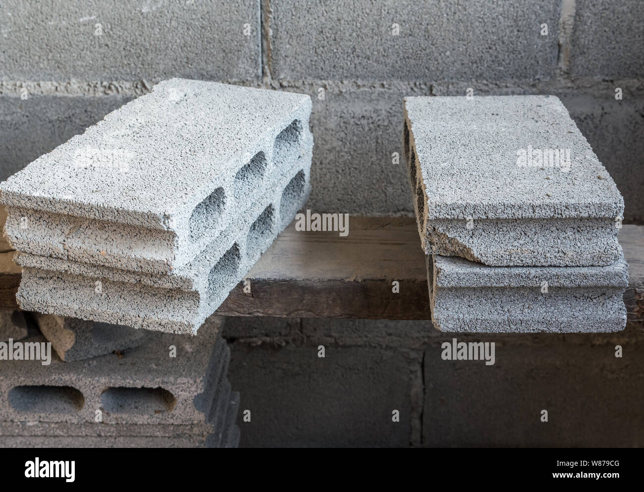 Cement block on the wooden scaffolding in the construction area for ...