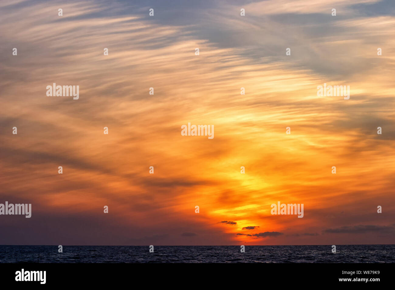 Beautiful sunset at the sea Stock Photo - Alamy