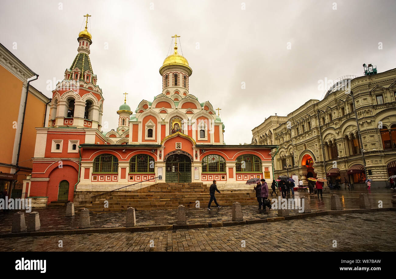 Moscow, Russia - Oct 4, 2016. People visit the Red Square in rainy day ...