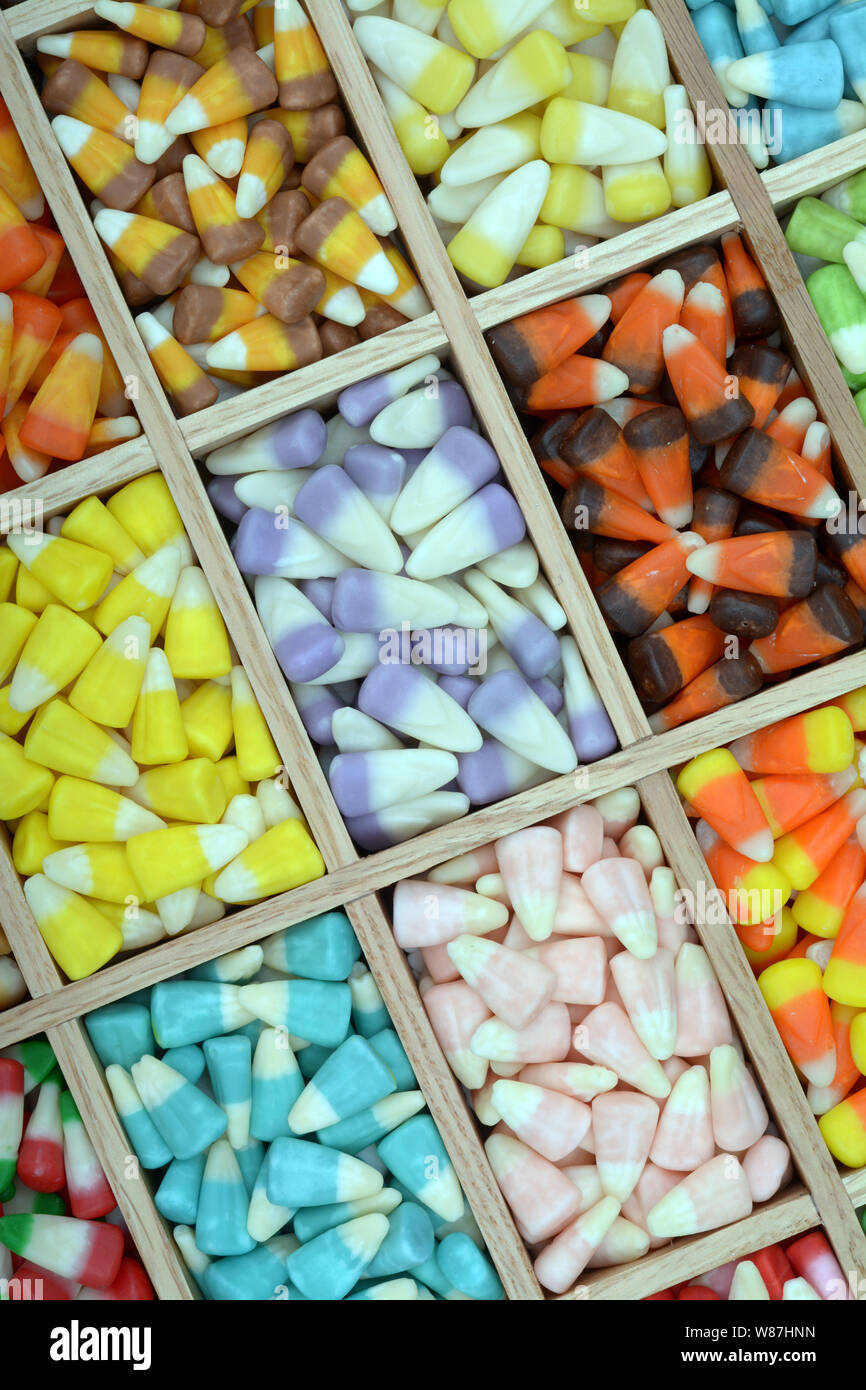 Tooth candies on wooden tray Stock Photo - Alamy