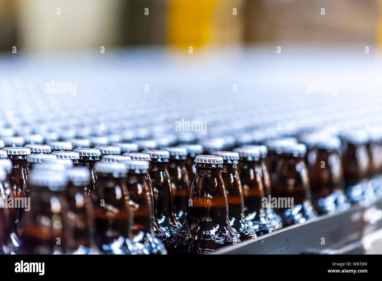 Rows of beer bottles in a brewery bottling plant Stock Photo - Alamy