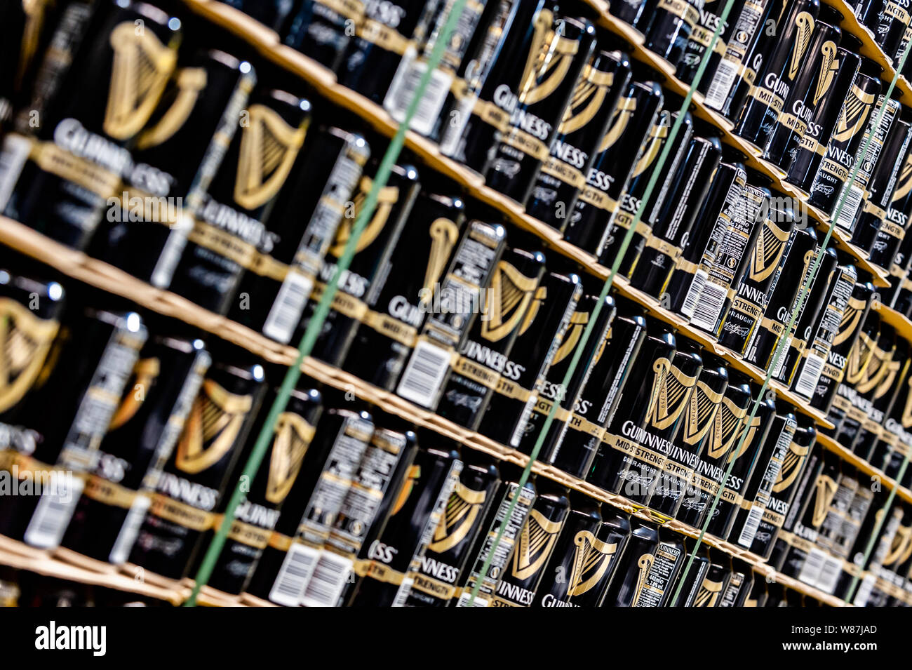 Rows of Guinness cans stored and strapped onto pallets Stock Photo - Alamy