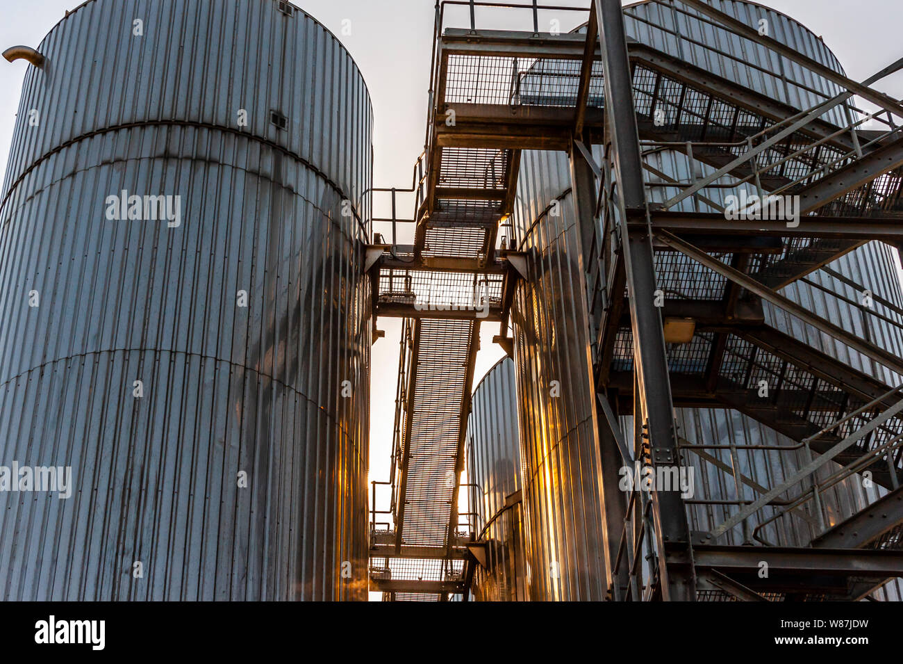 Massive storage containers at a brewery manufacturing plant Stock Photo ...