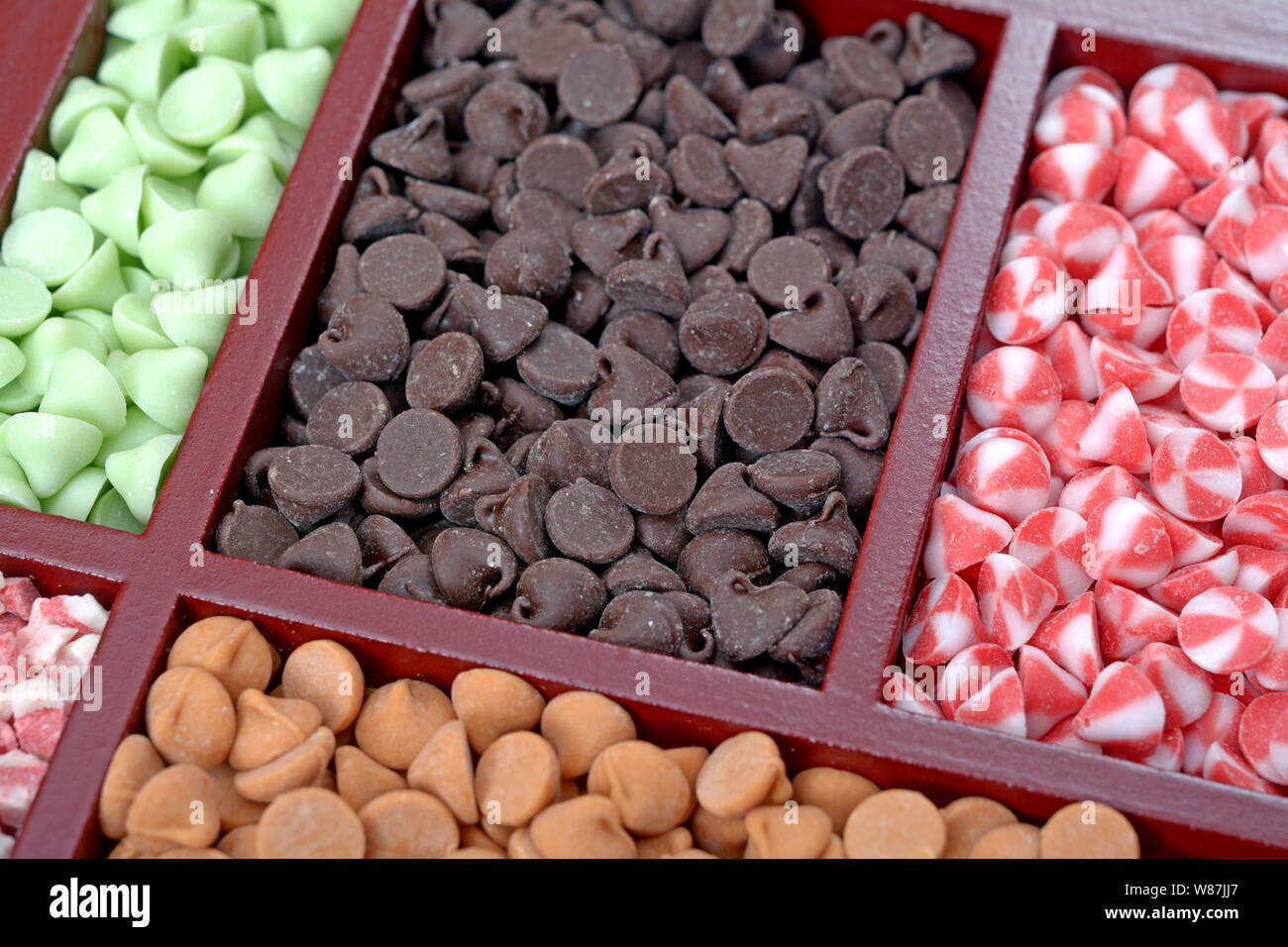 Mix chocolate chips on wooden box Stock Photo - Alamy