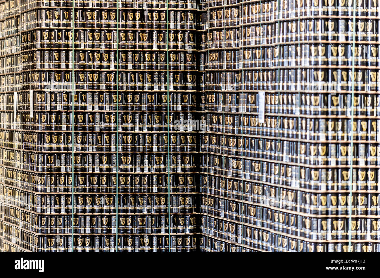 Rows of Guinness cans stored and strapped onto pallets Stock Photo - Alamy