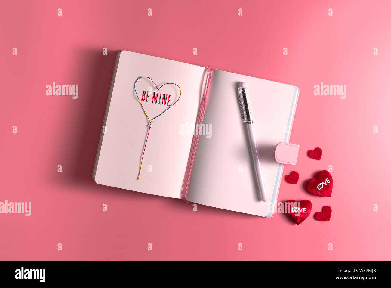 Be mine, Valentine Day concept, Love daily with red hearts on pink ...