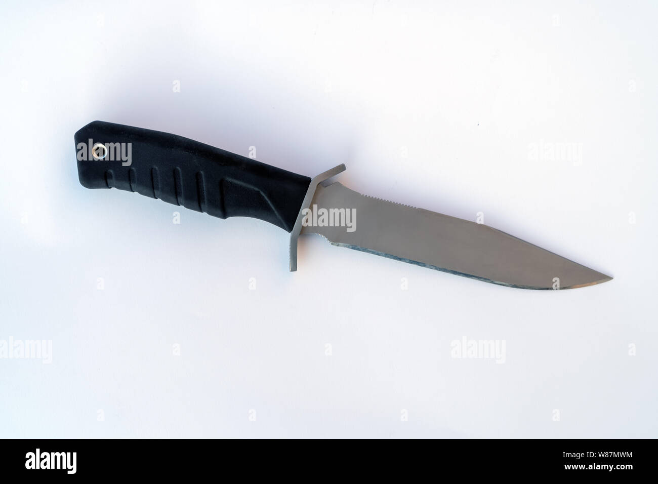 Black Army knife on a white background. knife close-up Stock Photo - Alamy