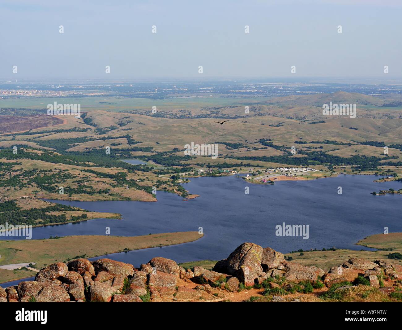Wide aerial view of Lake Lawtonka, seen from the peak of Mt. Scott ...