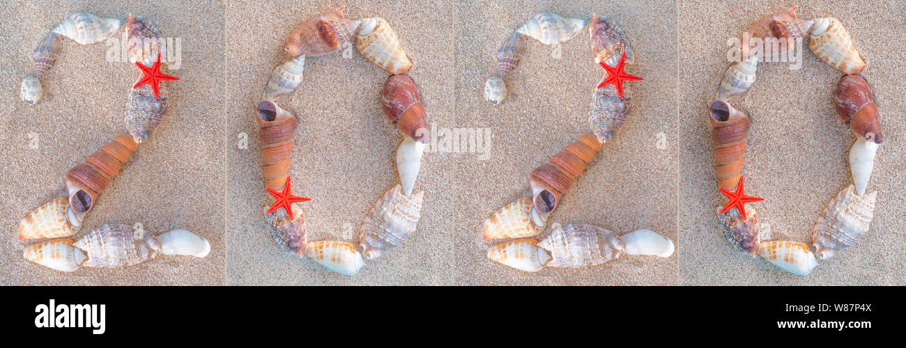 Calendar on sand. Year 2020. Seashells forming 2020 inscription on ...
