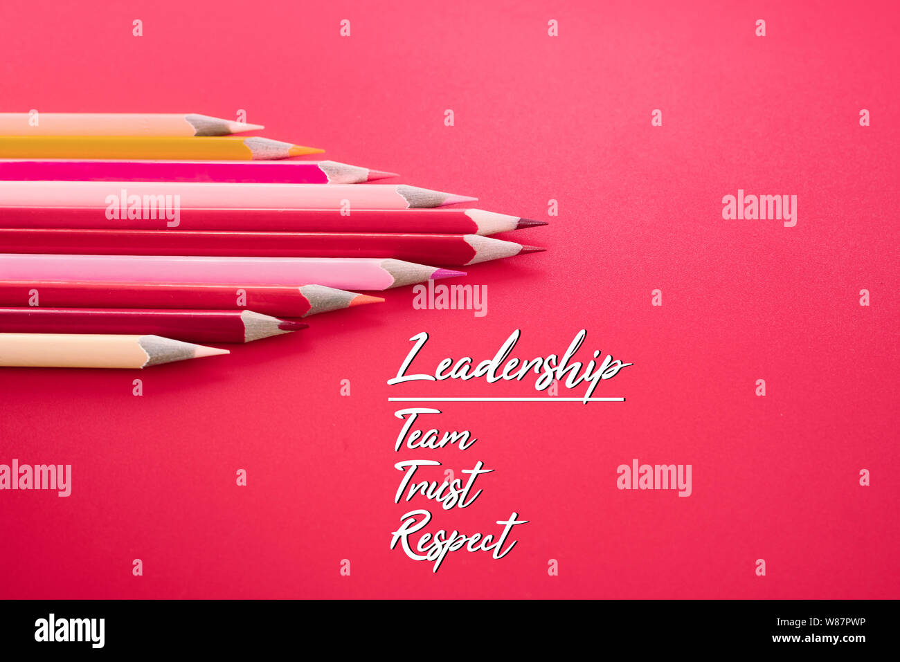 Leadership business concept. red color pencil lead other color with ...
