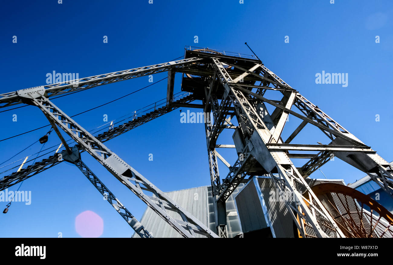 Old style steel lattice headgear mine shaft pulley wheel in South ...