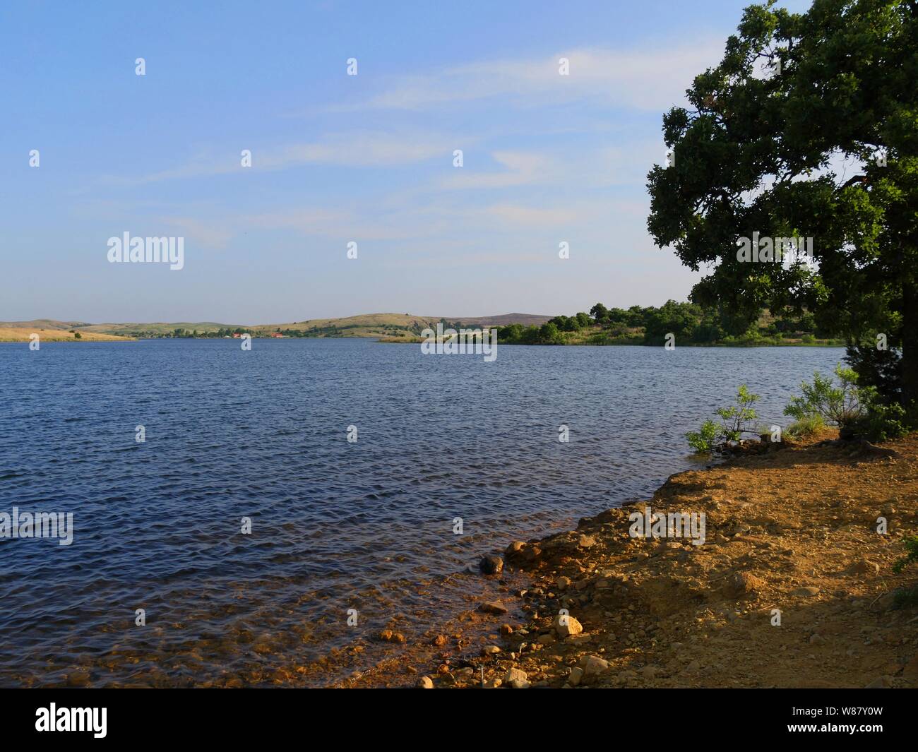 Lake Elmer Thomas with a tree in view at Comanche County, Oklahoma ...