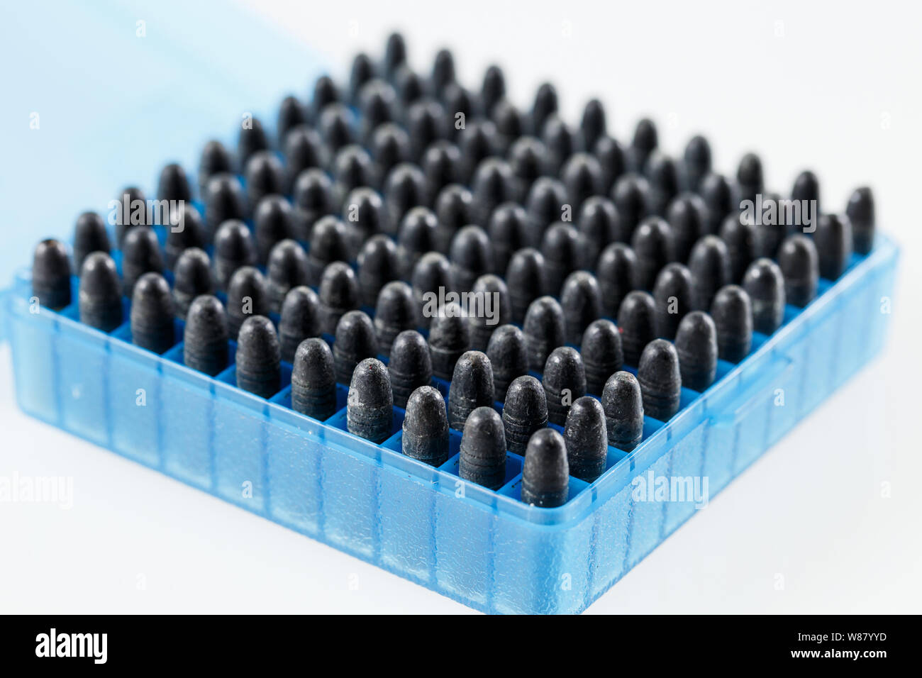 Hunting cartridges in a plastic box. Bullet storage box Stock Photo - Alamy