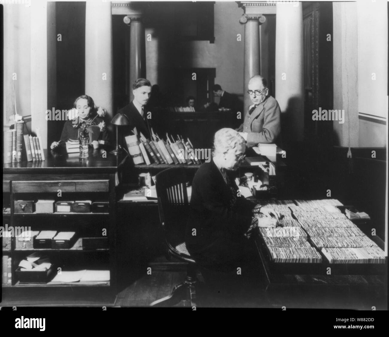 Library staff member hi-res stock photography and images - Alamy