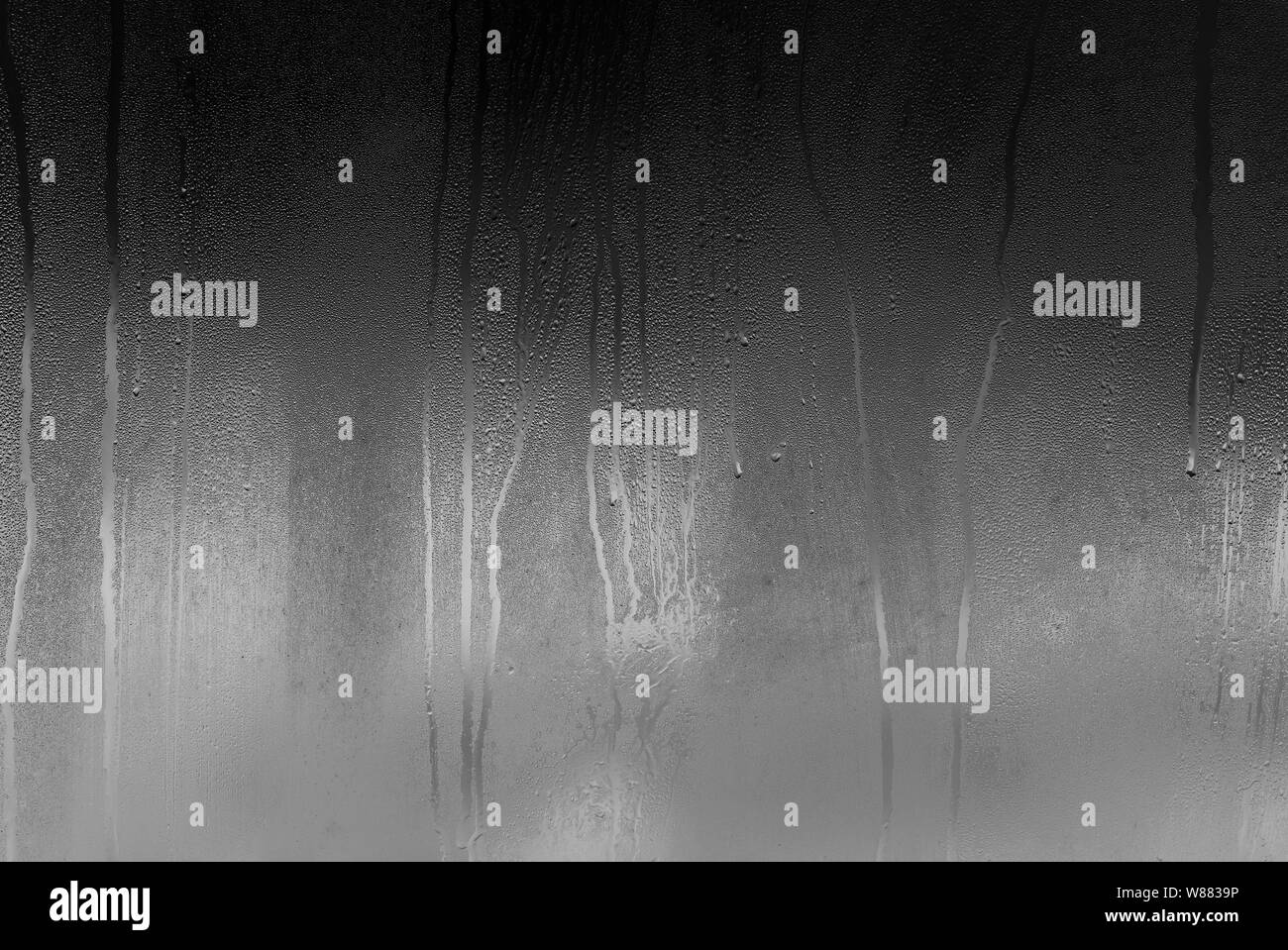 Real glass Window with steam and condensation on surface raining Night ...