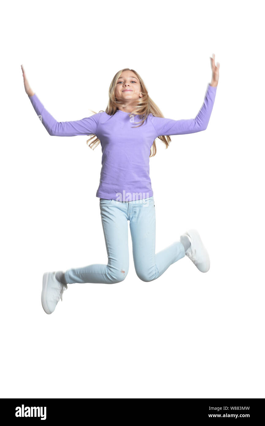 cute girl jumping isolated on white background Stock Photo - Alamy
