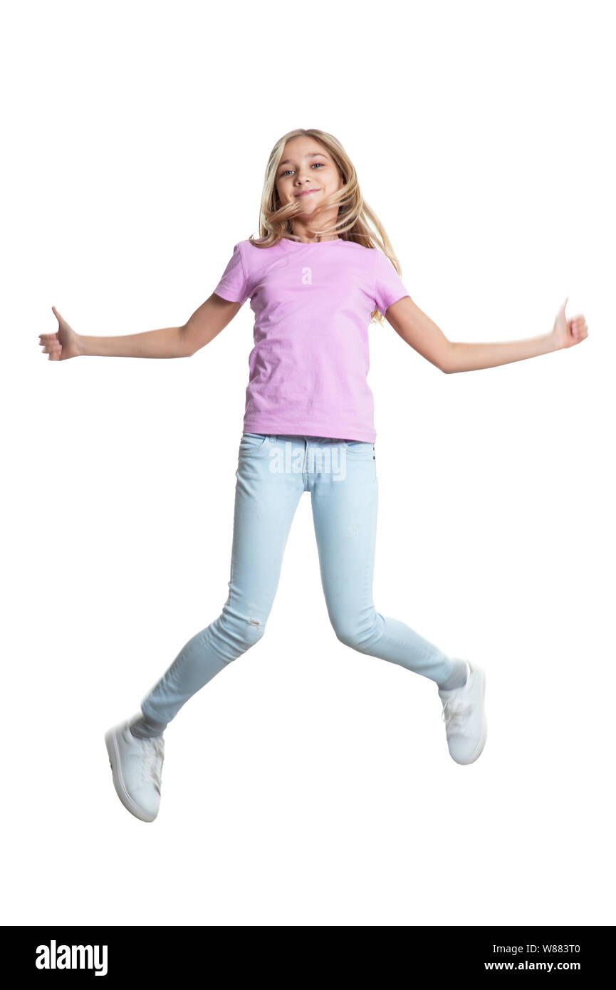cute girl jumping isolated on white background Stock Photo - Alamy